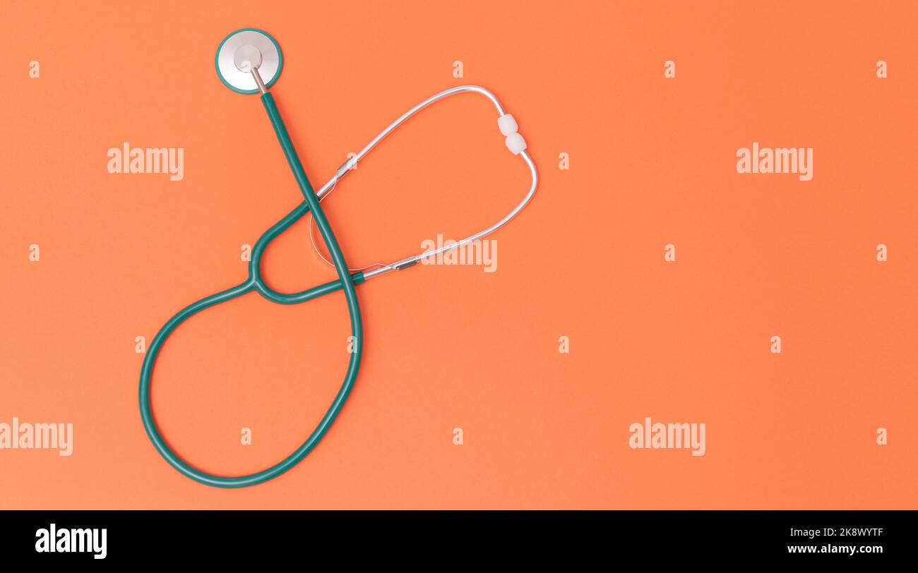 Medical stethoscope on color background with place for text. Abstract ...