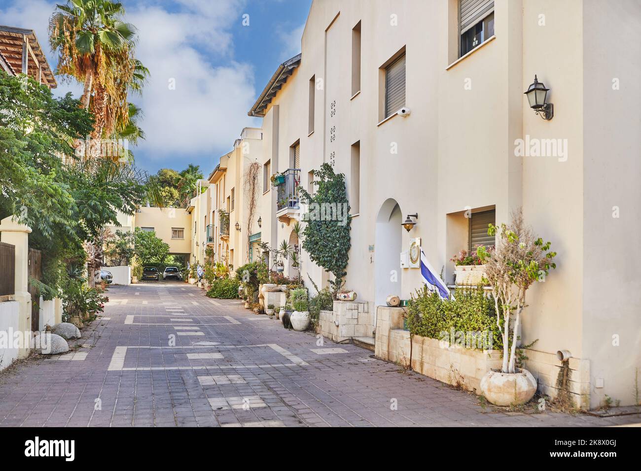 Nice Israeli courtyard with Mediterranean-style residential buildings ...