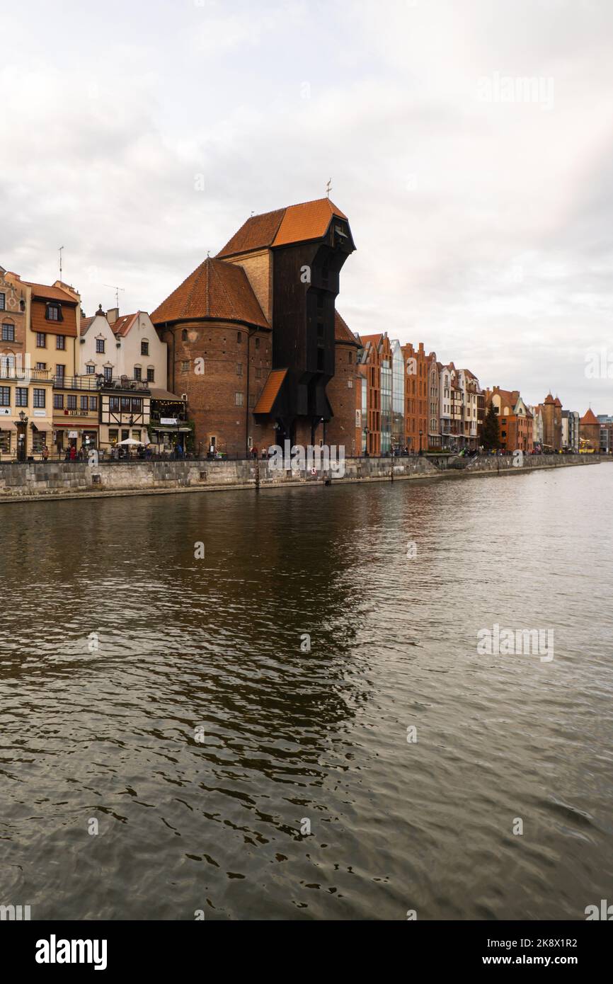 Ancient crane - zuraw Old town in Gdansk. The riverside on Granary ...