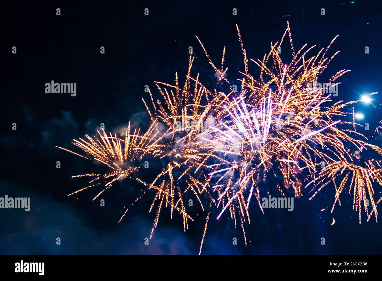 Bright light flash of fireworks, against the background of the night ...