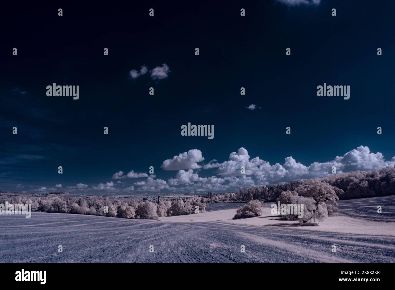 infrared photography - ir photo of landscape under sky with clouds ...