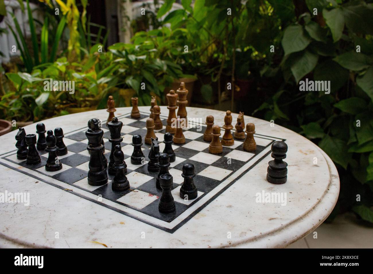 Outdoor chessboard with figures. Competition and strategy concept ...