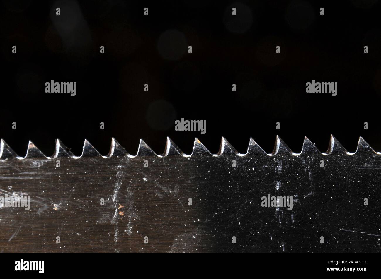 Close-up of teeth of hand wood saw Stock Photo - Alamy