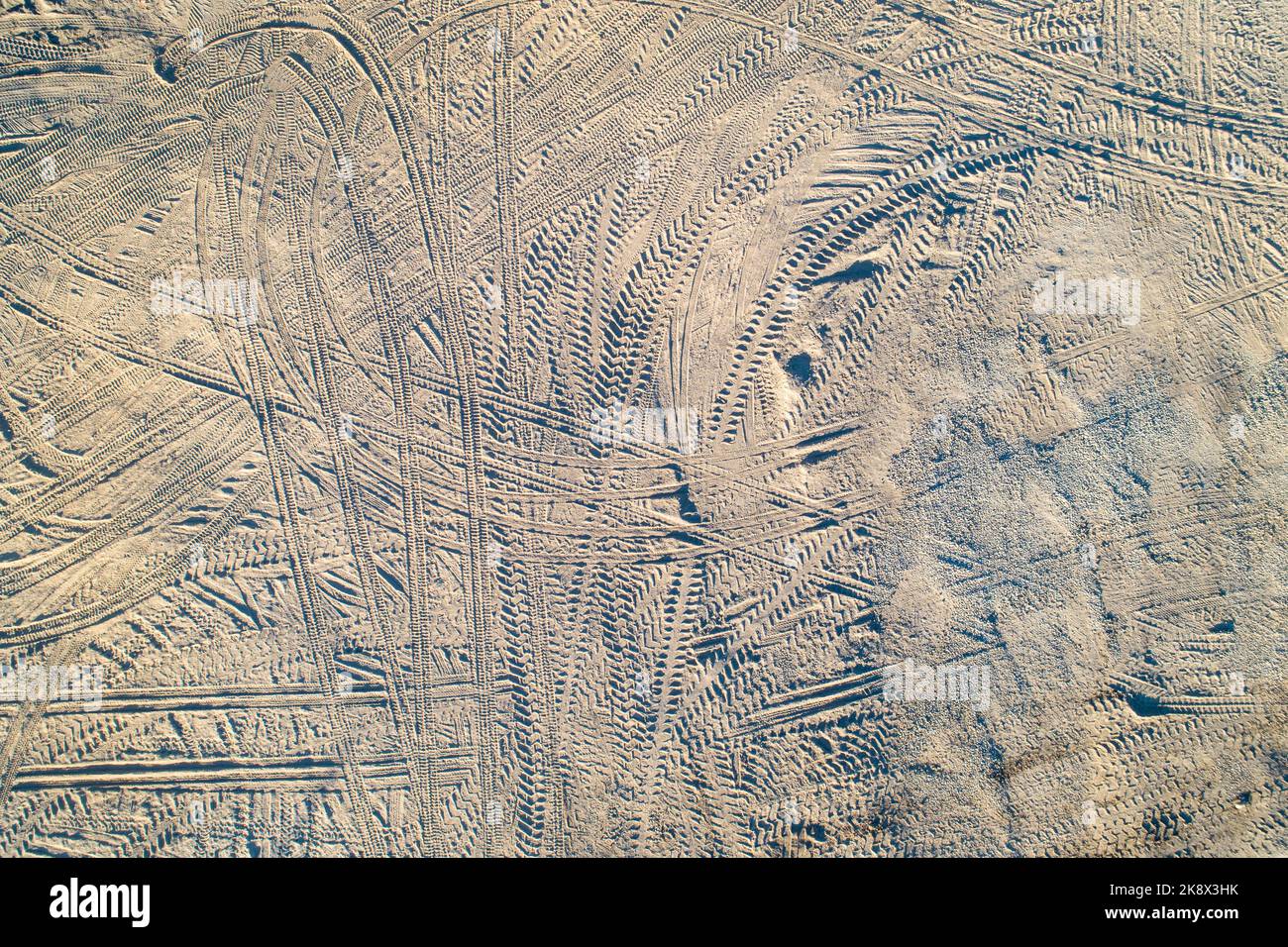 heavy equipment leaving tracks in the dirt Stock Photo - Alamy