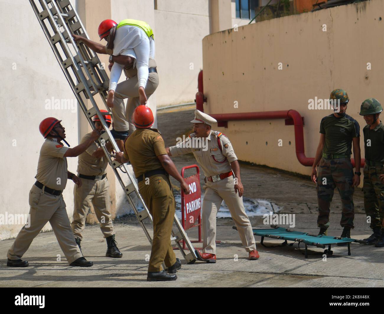 Personnel from the State Disaster Response team train during a mock ...