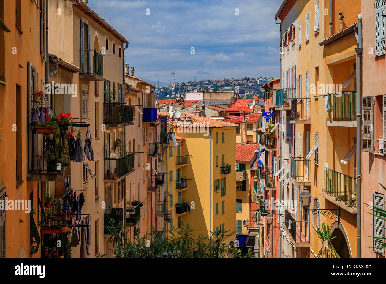 Mediterranean house facades in terracotta colors, windows with ...