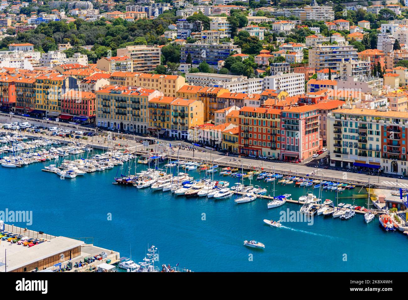 View of boats in the marina and waterfront buildings in Nice port on ...