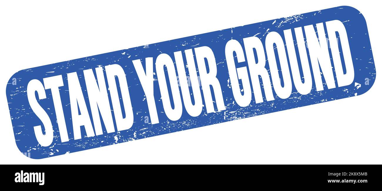 STAND YOUR GROUND text written on blue grungy stamp sign Stock Photo ...