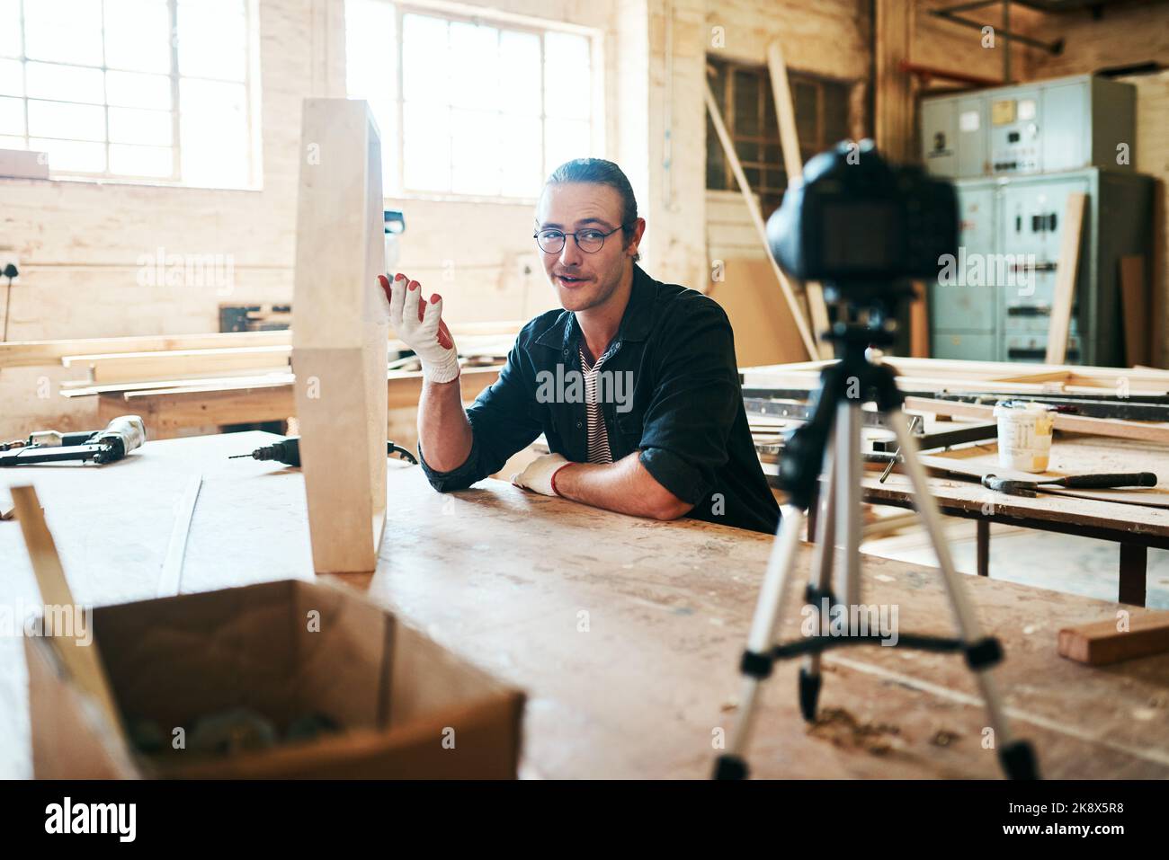 Its as easy as that ladies and gentleman. young carpenter recording a ...