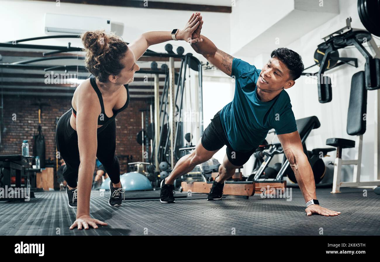 We are each others biggest supporter. two sporty young people working ...