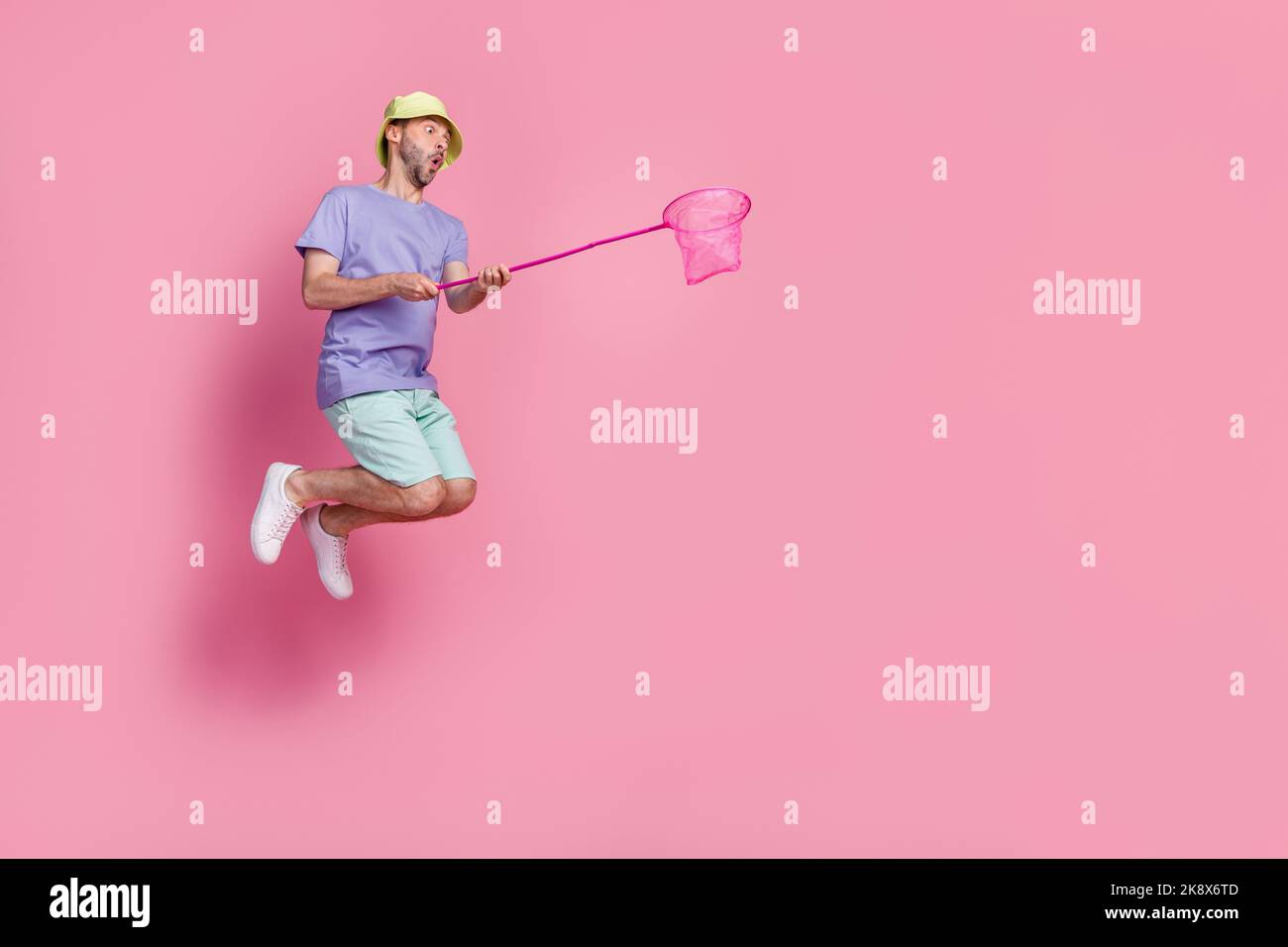 Full length photo of attractive young man jumping impressed astonished ...