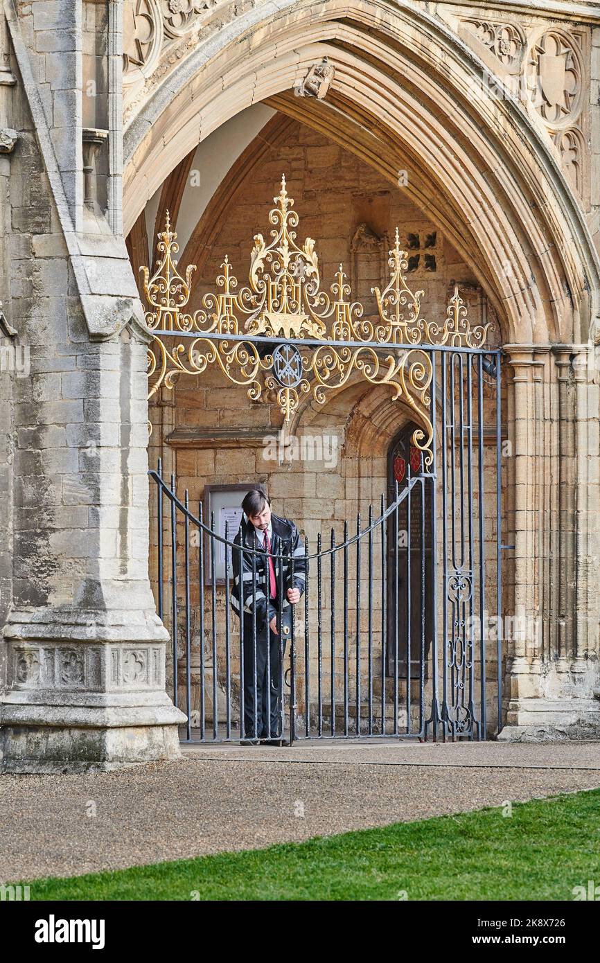 A security guard locks the gate entrance at the west front of the ...