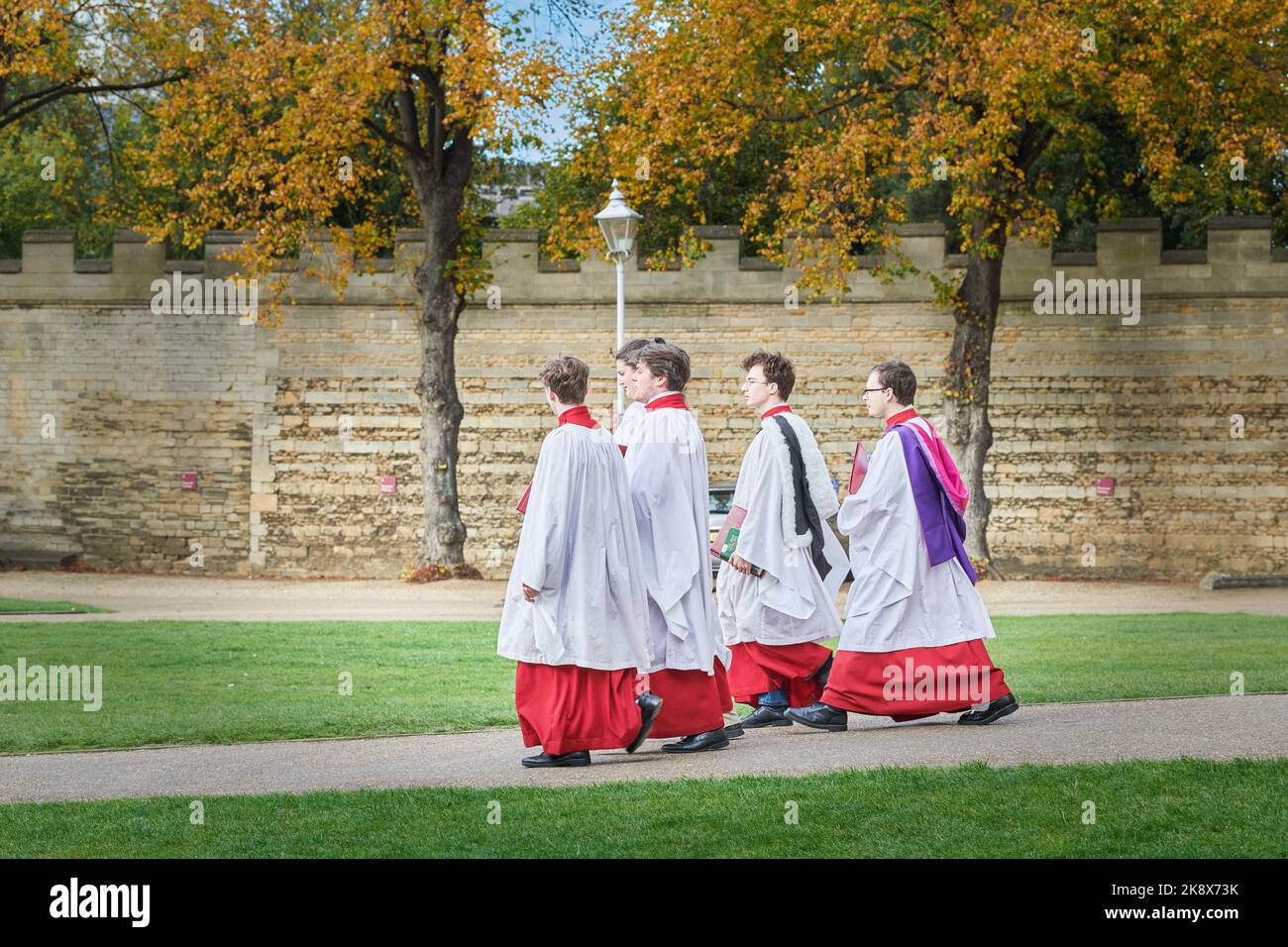A group of religious leaders leaves the west entrance at the medieval ...
