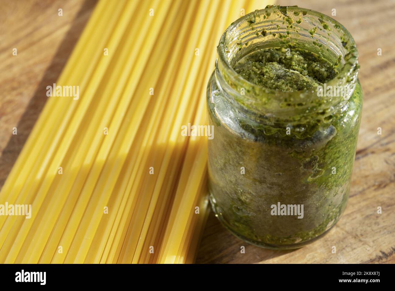 frozen homemade basil pesto with raw spaghetti Stock Photo - Alamy