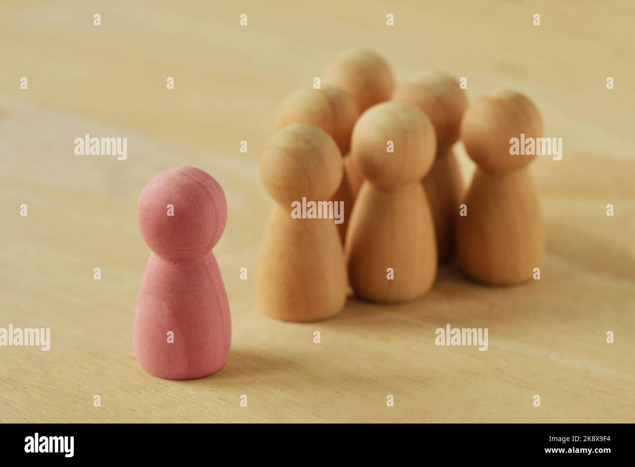 Pink pawn in leadership position with group of pawns - Concept of women ... Pink pawn in leadership position with group of pawns - Concept of women ...