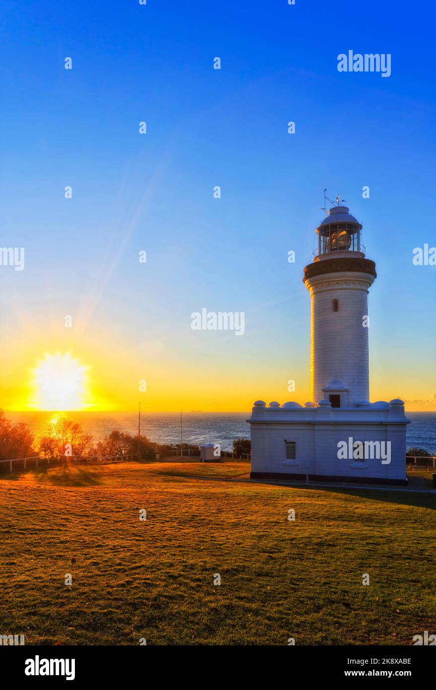 White stone landmark lighthouse at Norah Head of Australian pacific ...