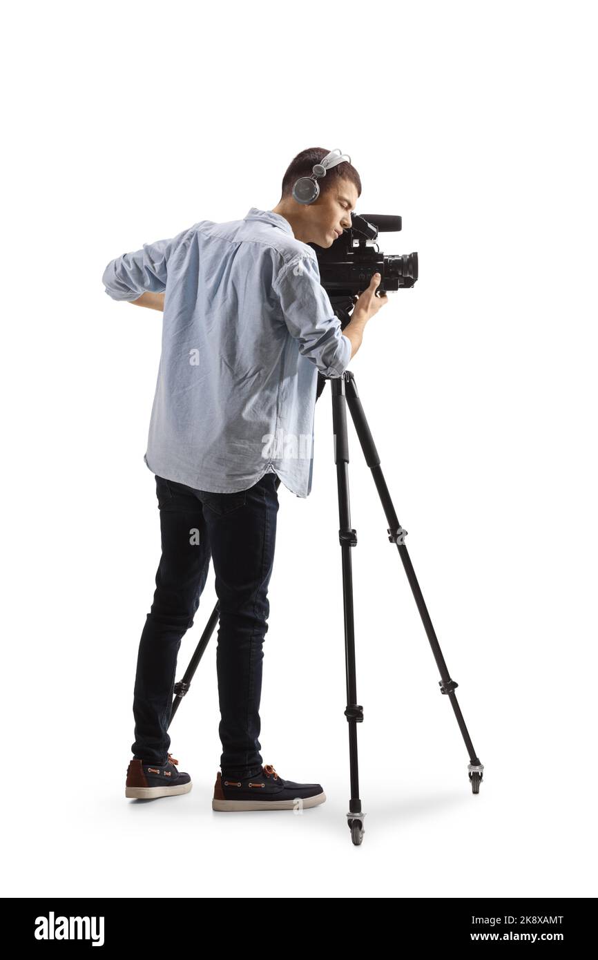 Full length shot of a camera man recording with camera on a stand ...