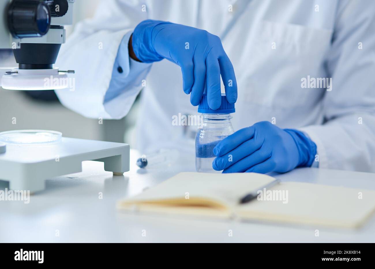 Why isnt this closed properly. Closeup of an unrecognizable scientist ...