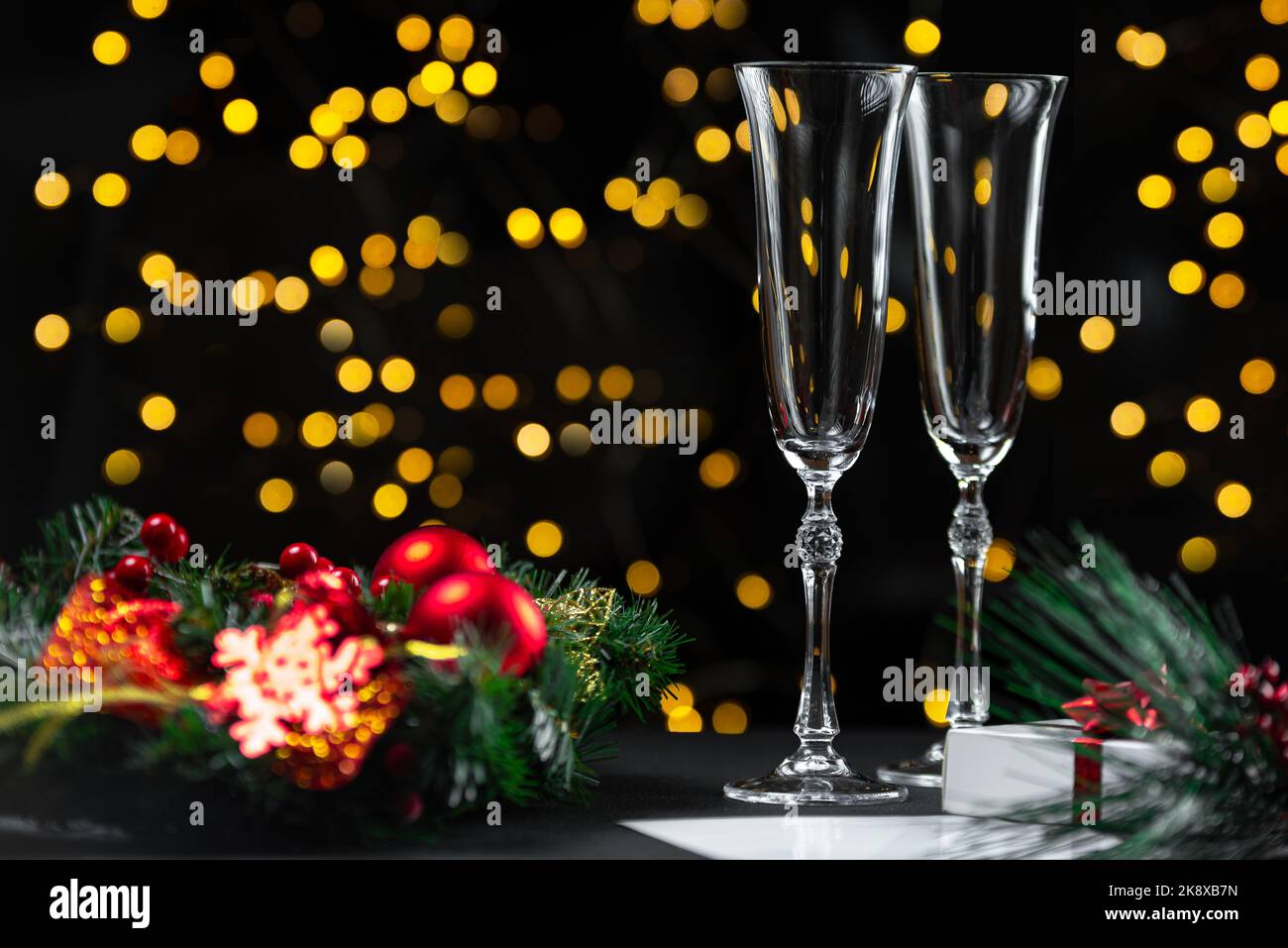 New Year's Eve 2022. Champagne glass with bokeh lights on dark background Stock Photo - Alamy