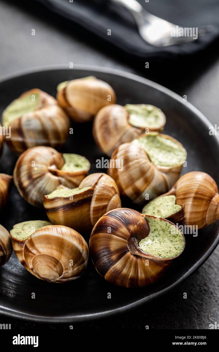 Snails with parsley butter, Bourgogne Escargot Snails on the plate ...