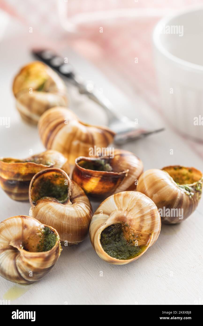 Snails with parsley butter, Bourgogne Escargot Snails on the cutting ...