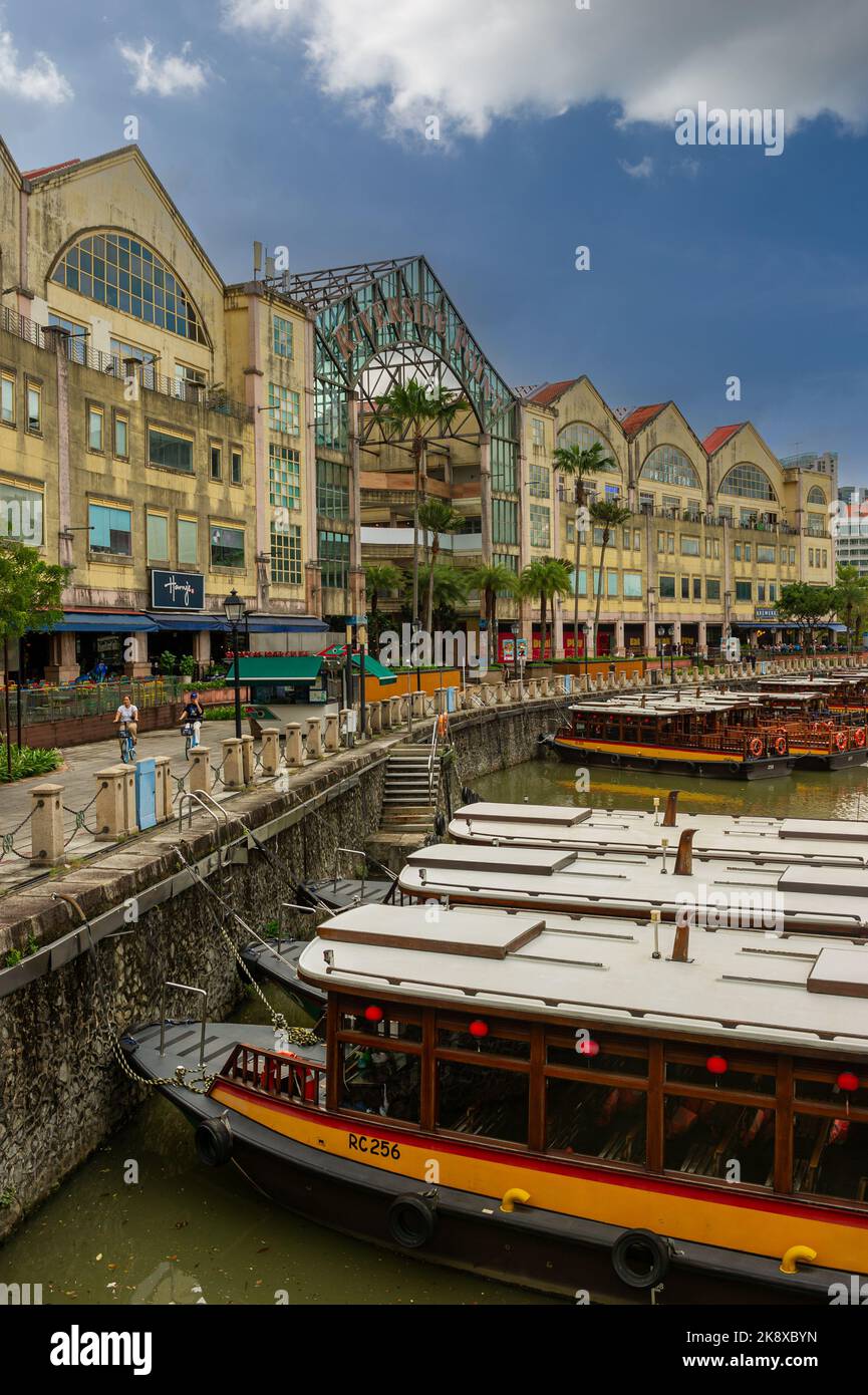 Tourist boats awaiting a river cruise, at Riverside Point, Singapore ...