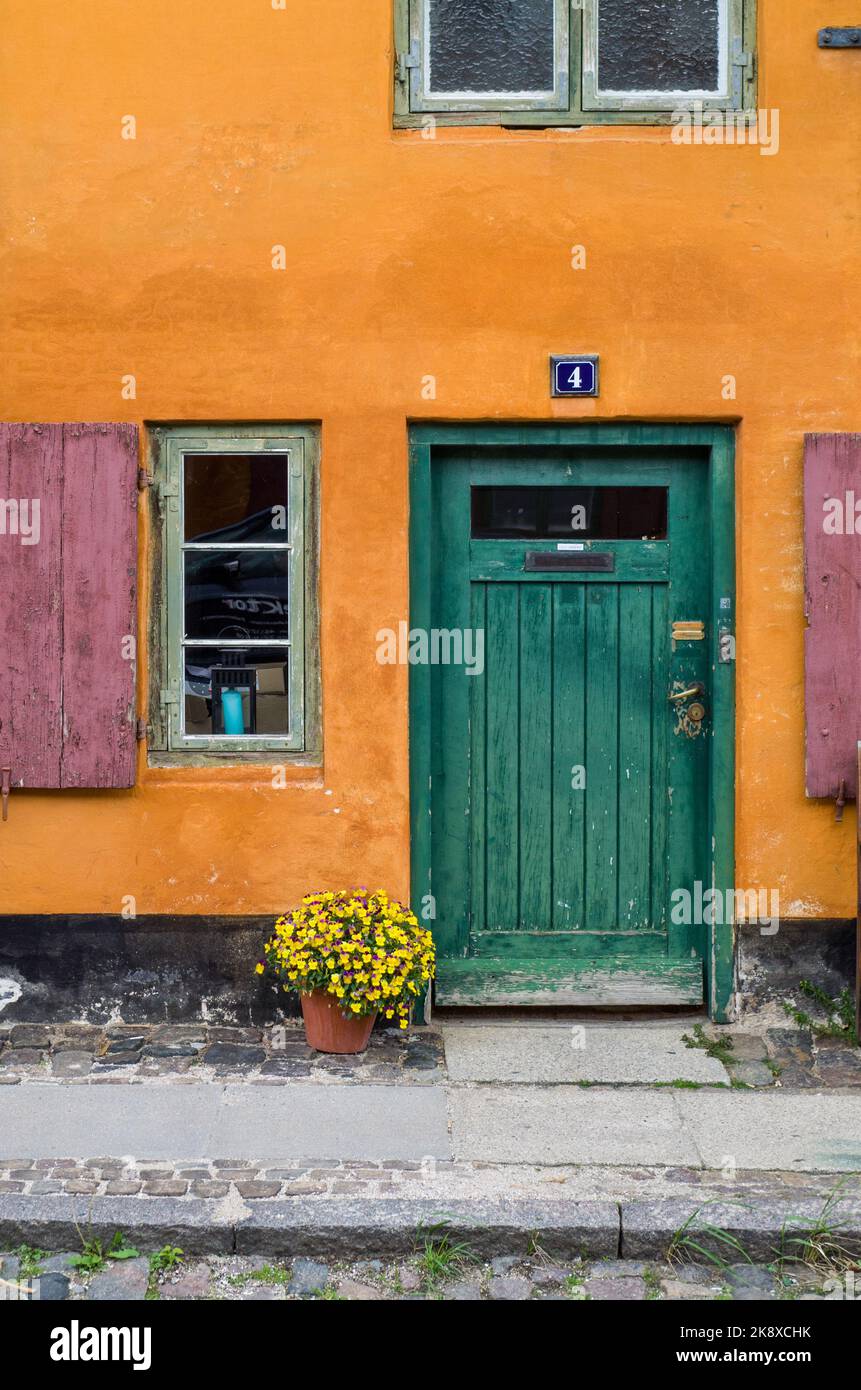 Distinctive yellow terraced houses in the Nyboder district of ...