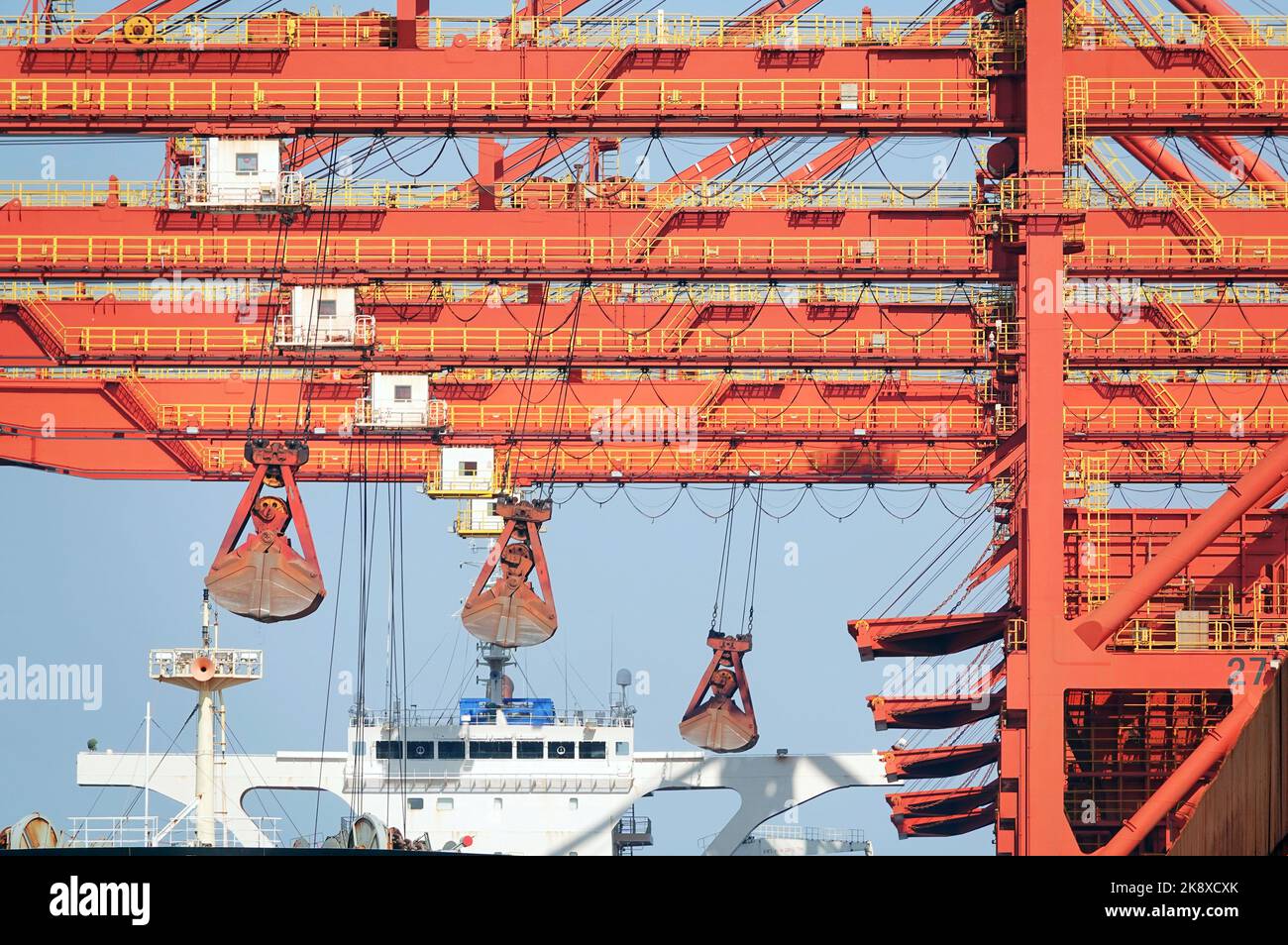 The ship unloader was unloading iron ores at the 400000 ton ore ...
