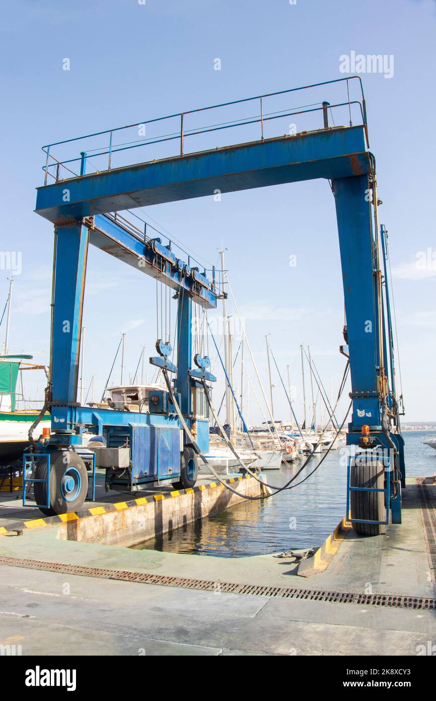 boat yard and marine hoist or boat lift crane in harbour Club Maritimo ...