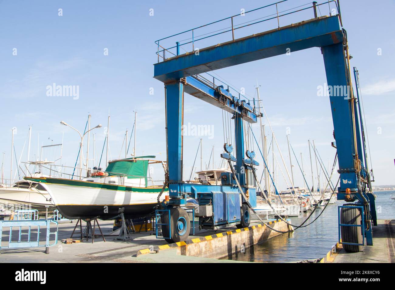 boat yard and marine hoist or boat lift crane in harbour Club Maritimo ...