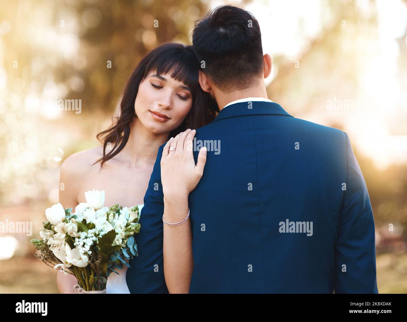 I feel safe when Im with him. a young couple standing together on their ...