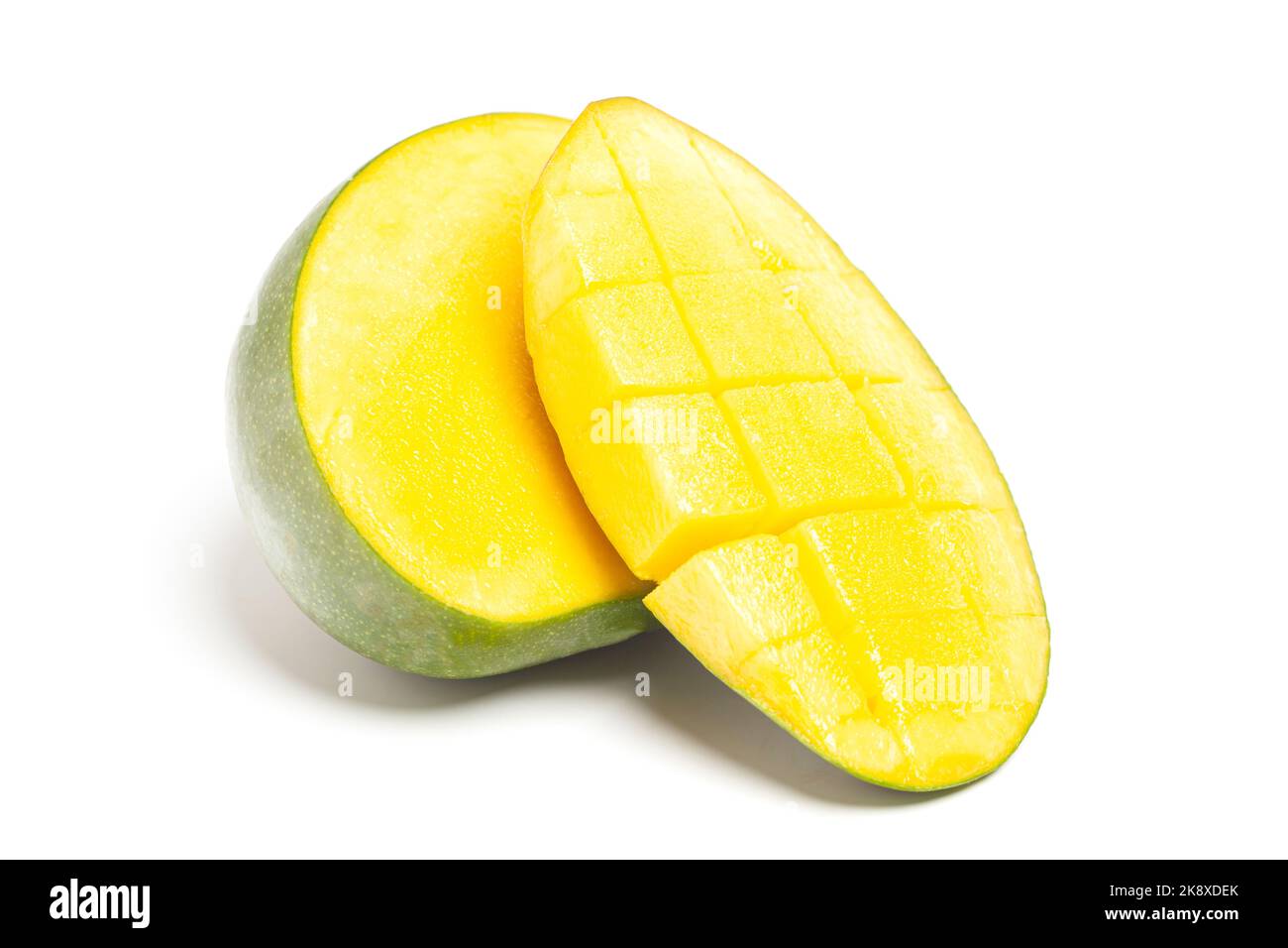 chopped half of ripe mango fruit isolated on white background Stock ...