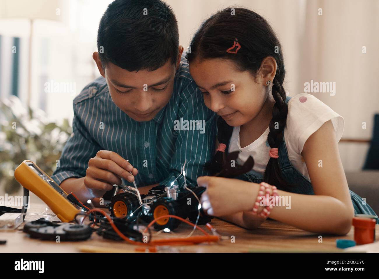 We can build anything we put our minds to. two adorable young siblings ...