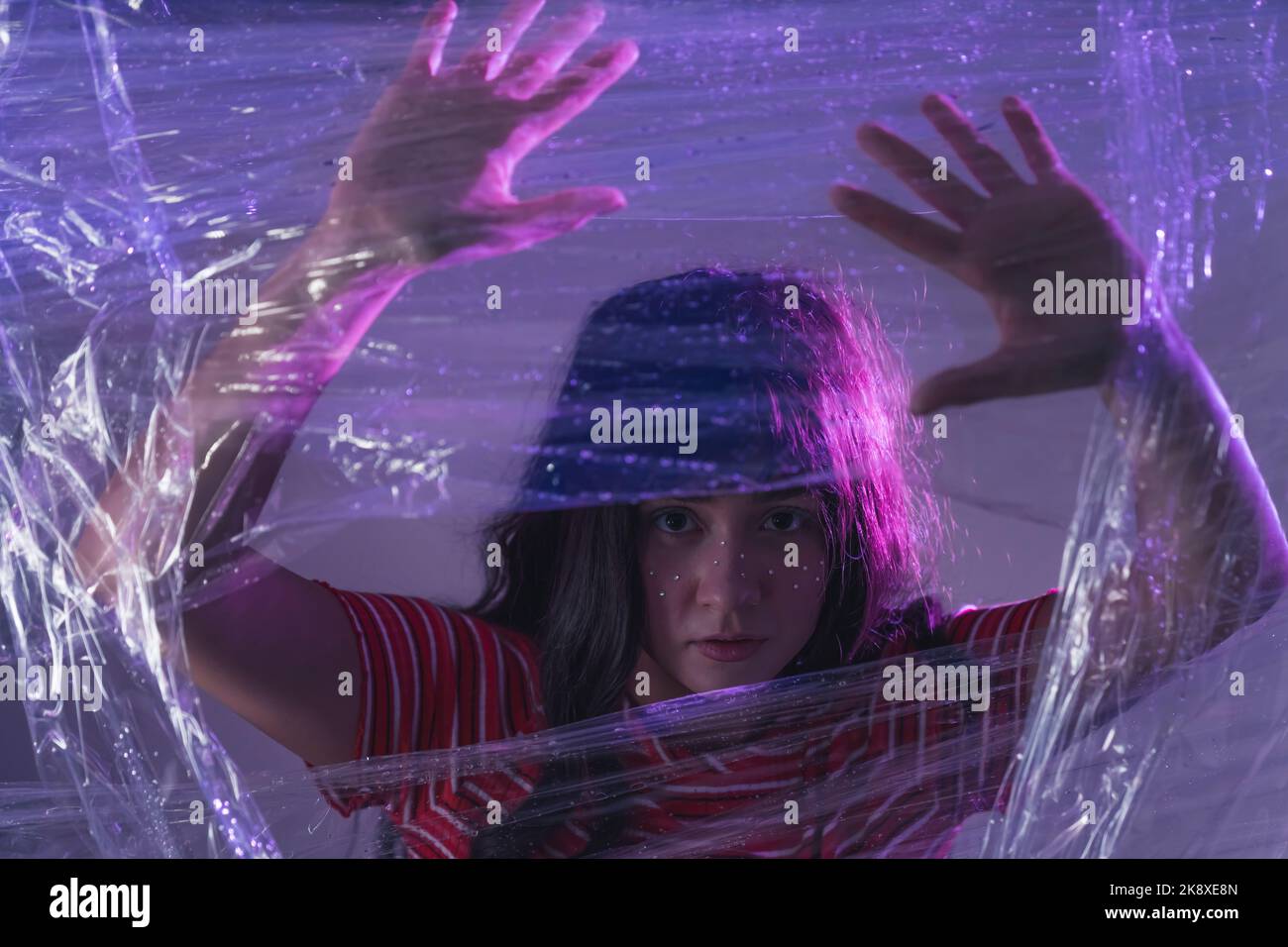 Artistic depiction of overwhelming anxiety. Young attractive long ...