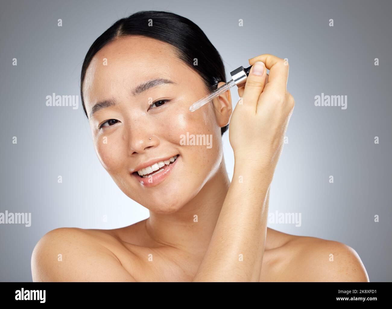 Asian woman skincare, facial serum and essential oil, aesthetic makeup ...