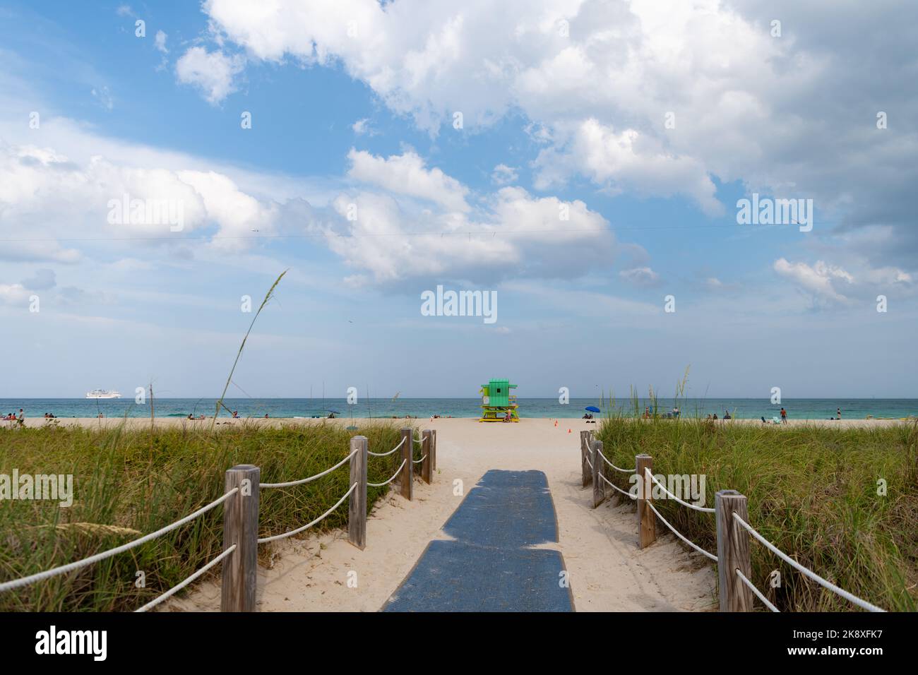 empty pathway road leading to summer seashore Stock Photo - Alamy