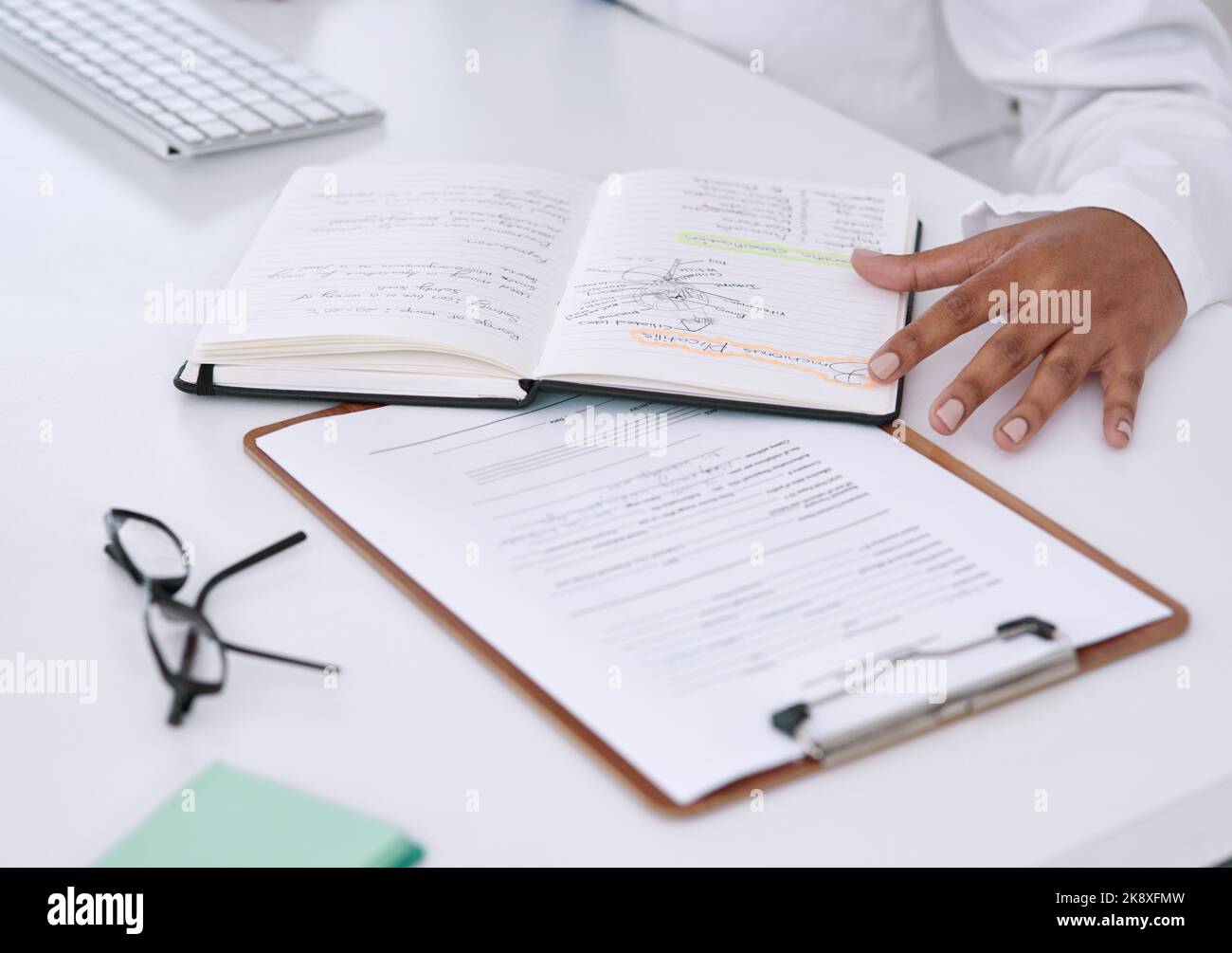 Information is key in science. High angle shot of an unrecognizable ...