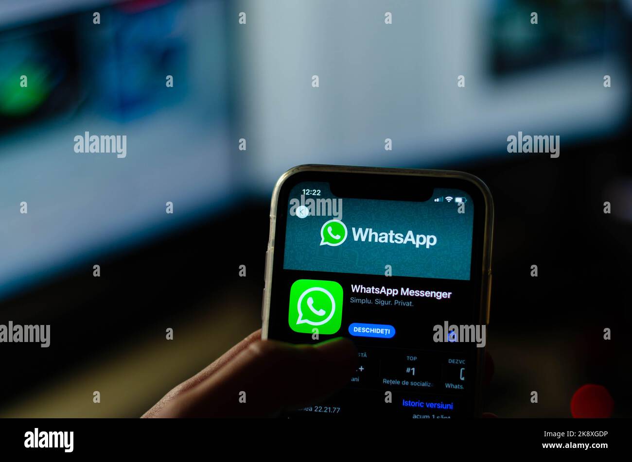 Hands Holding Mobile Smart Phone Device With Whatsapp Company App Logo ...