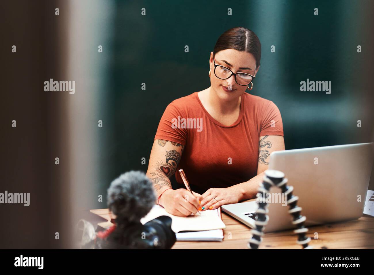 An entrepreneurs job is never done. an attractive young businesswoman ...