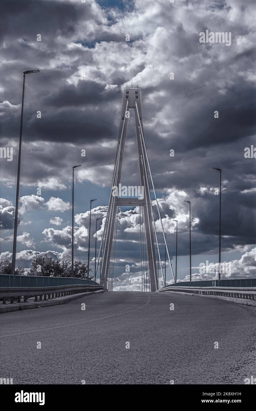 The Ottergembrug bridge under a dramatic cloudy sky in Belgium ...