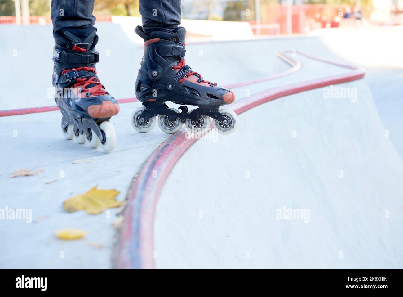 Man's legs in rollerblades. Leisure activities outdoors in autumn sunny ...