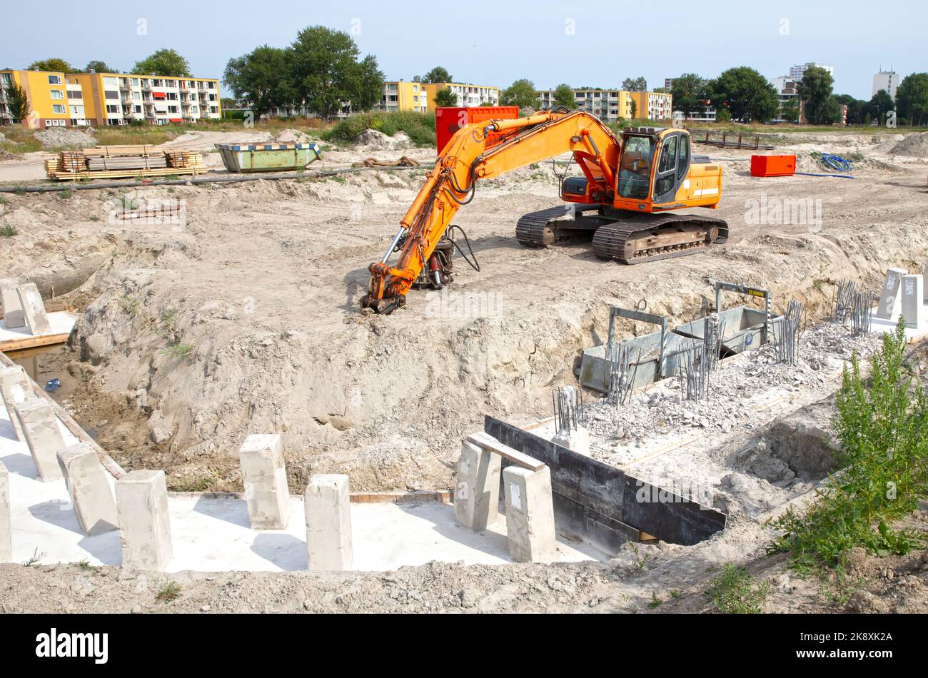 Concrete piles foundation for a new building on construction site ...