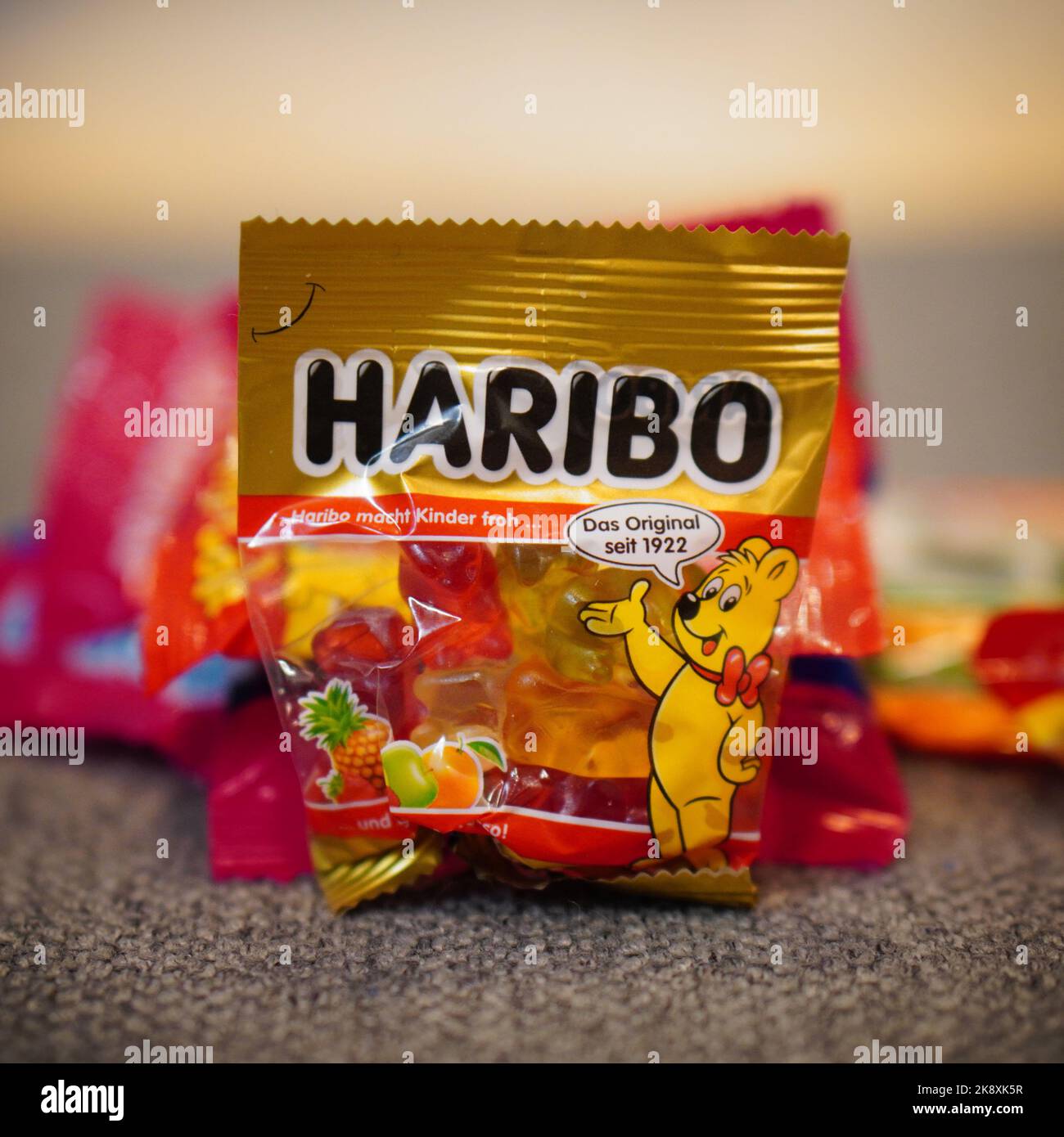 The Haribo brand colorful gummy bear candies in bags. Poznan, Poland ...