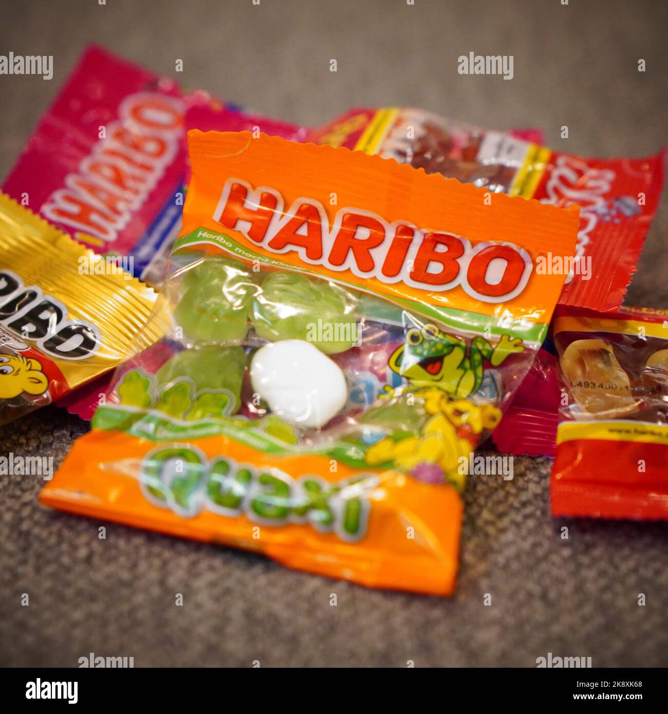 The Haribo brand colorful frog candies in bags. Poznan, Poland Stock ...