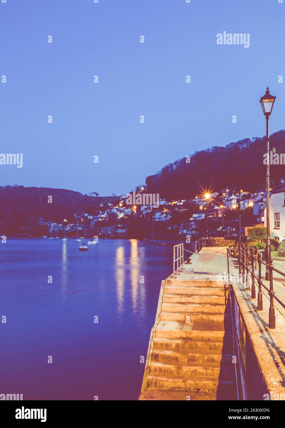 Harbour steps and town citylights at the English seaside port of ...