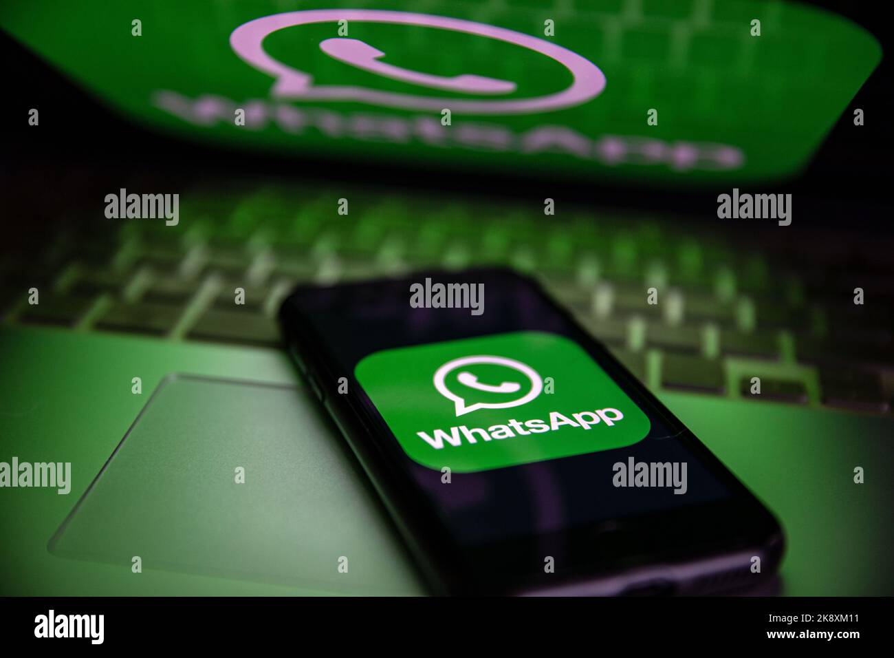 In this photo illustration, a WhatsApp logo seen displayed on a ...