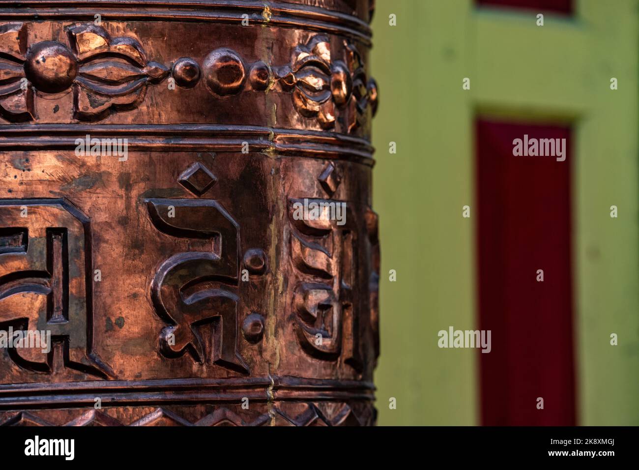 A closeup of a beautiful Tibetan prayer wheel detail Stock Photo - Alamy