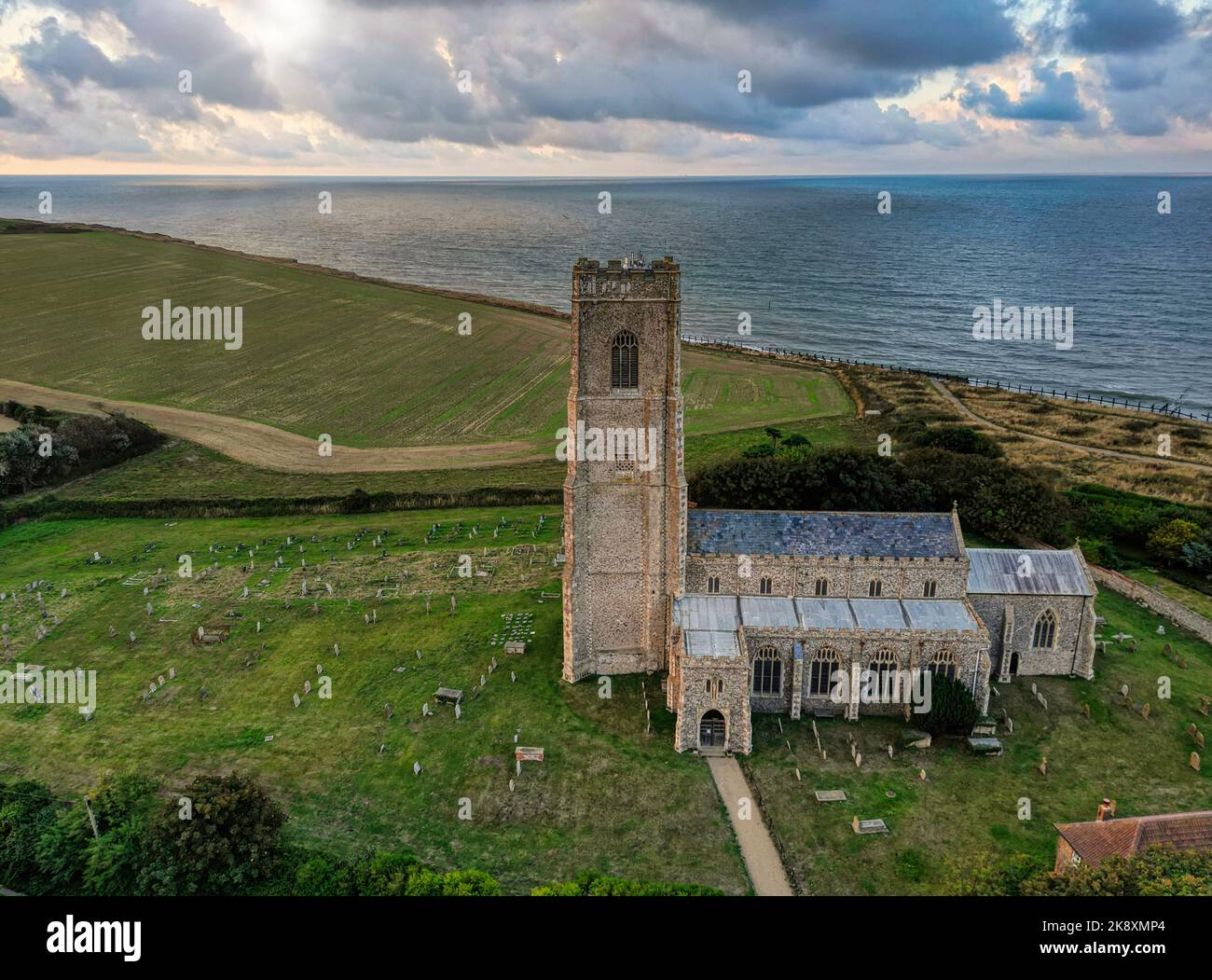 An aerial shot of a medieval building in Happisburgh village, on a ...