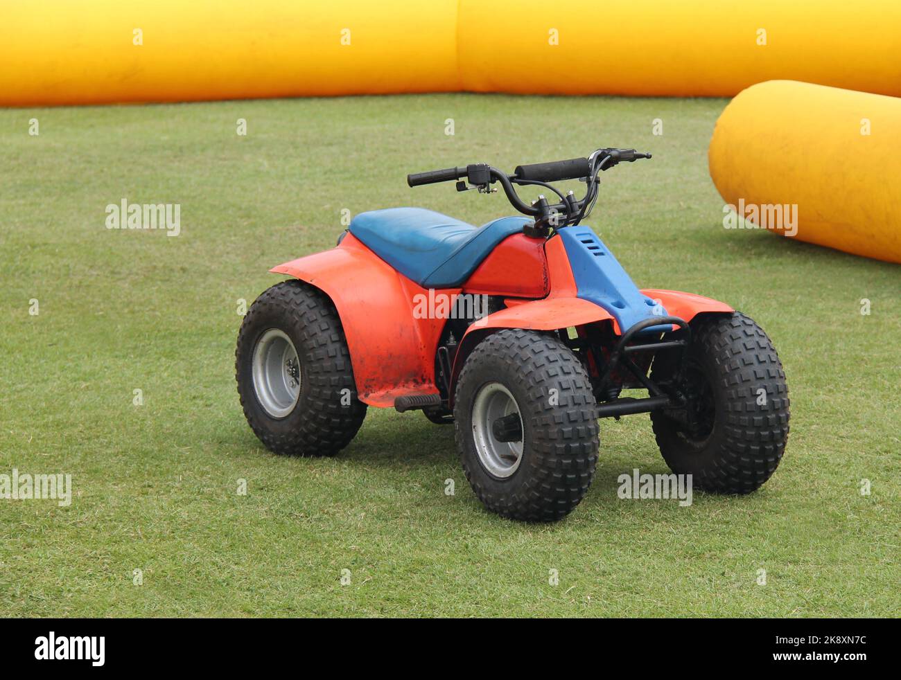 A Mechanical Quad Bike on a Fun Day Circuit Stock Photo - Alamy