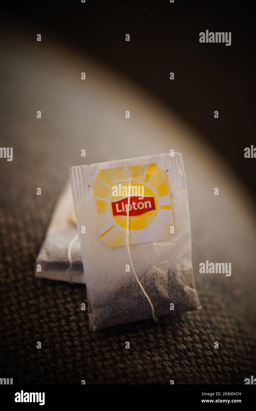 A vertical closeup of Lipton brand black tea bag on the table Stock ...